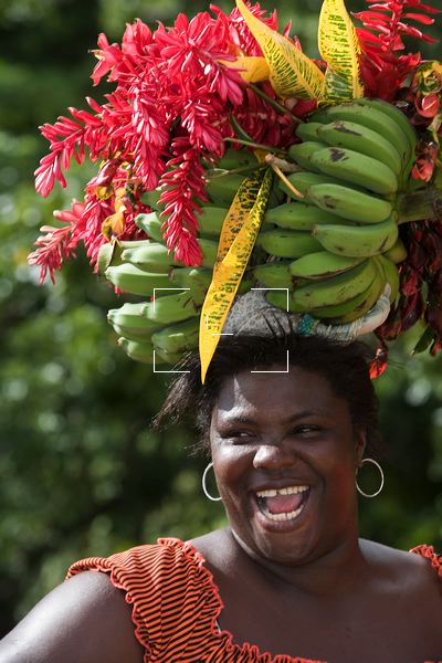 Grenada | Grenadian Woman with Fruit on Head | 2005-12-06-053.tif