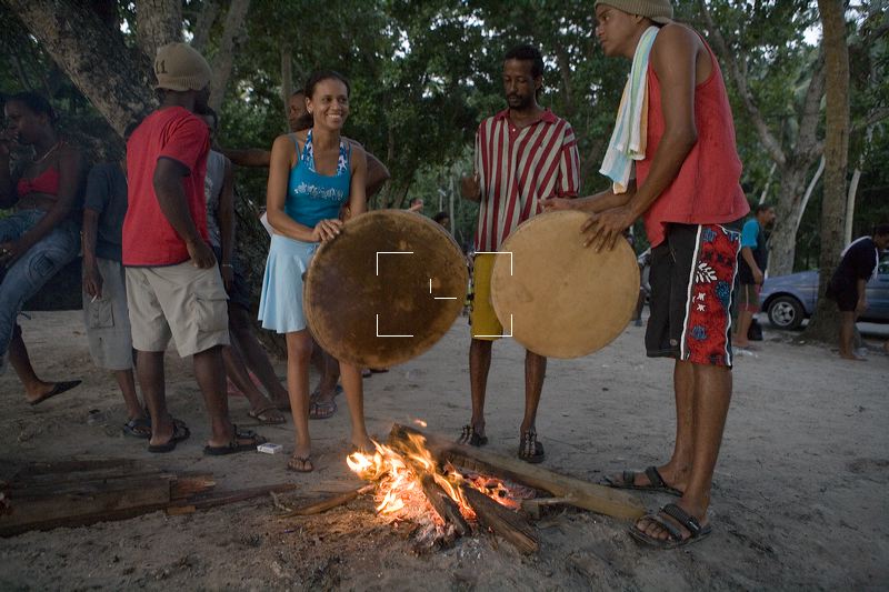 Seychelles | Heating Tanbour Moutya Fire Drum | 2006-04-09-093.tif